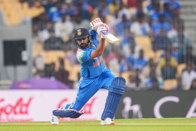 Rohit Sharma brings up much-needed 50 with a four off Rashid Khan in ...