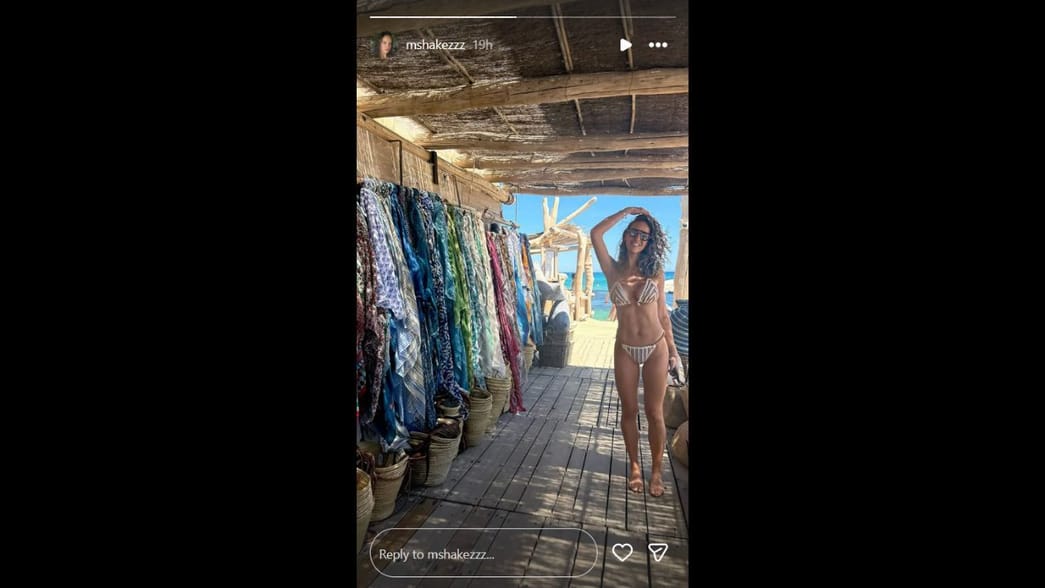 Stone Garrett's girlfriend Maria Shakespeare dons striped string bikini ...