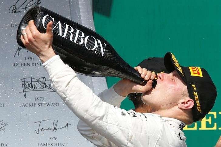 Motor racing: Champagne makes official return to the F1 podium